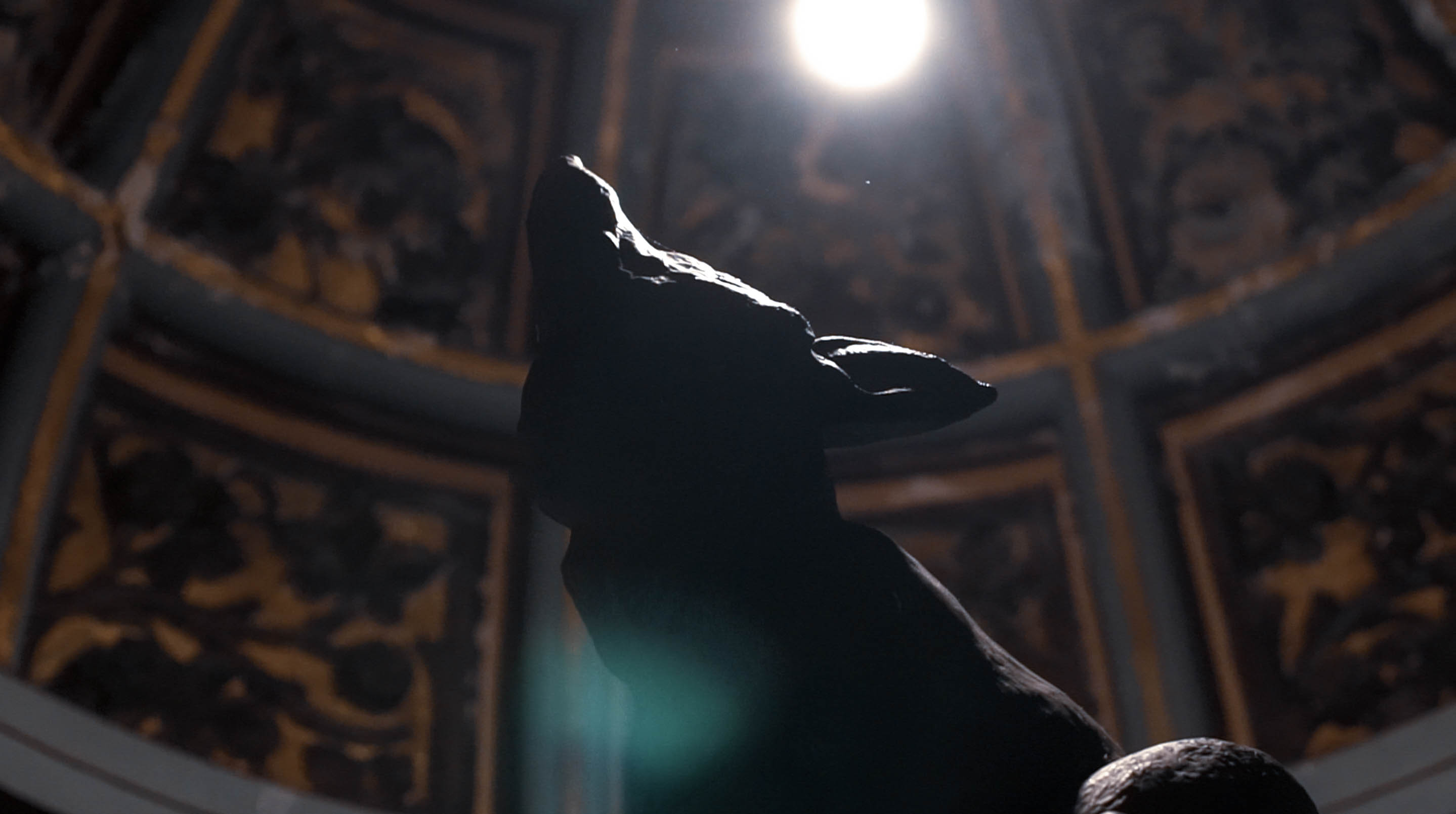 A wolf statue inside the castle at St Fagans National Museum ...